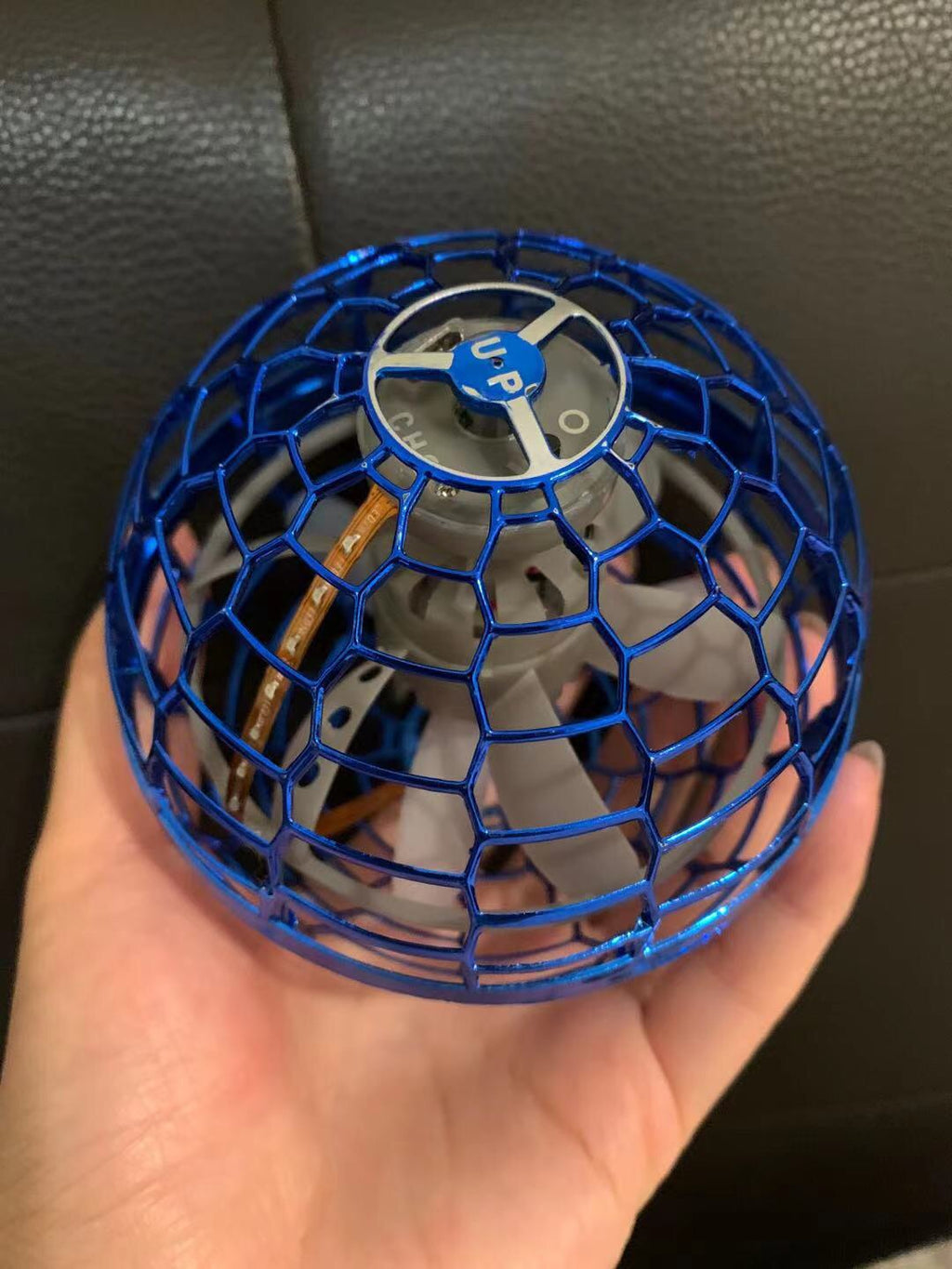 Flynova Pro spinning flying toy drone with LED lights, enclosed blades